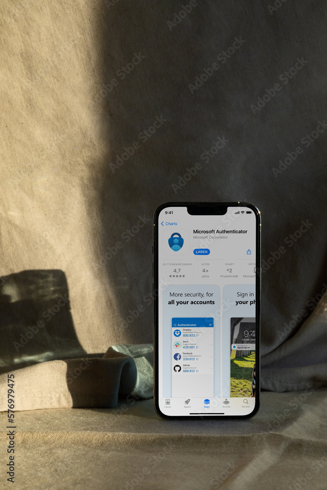 Mobile phone with Microsoft Authenticator App Store screen Stock Photo ...