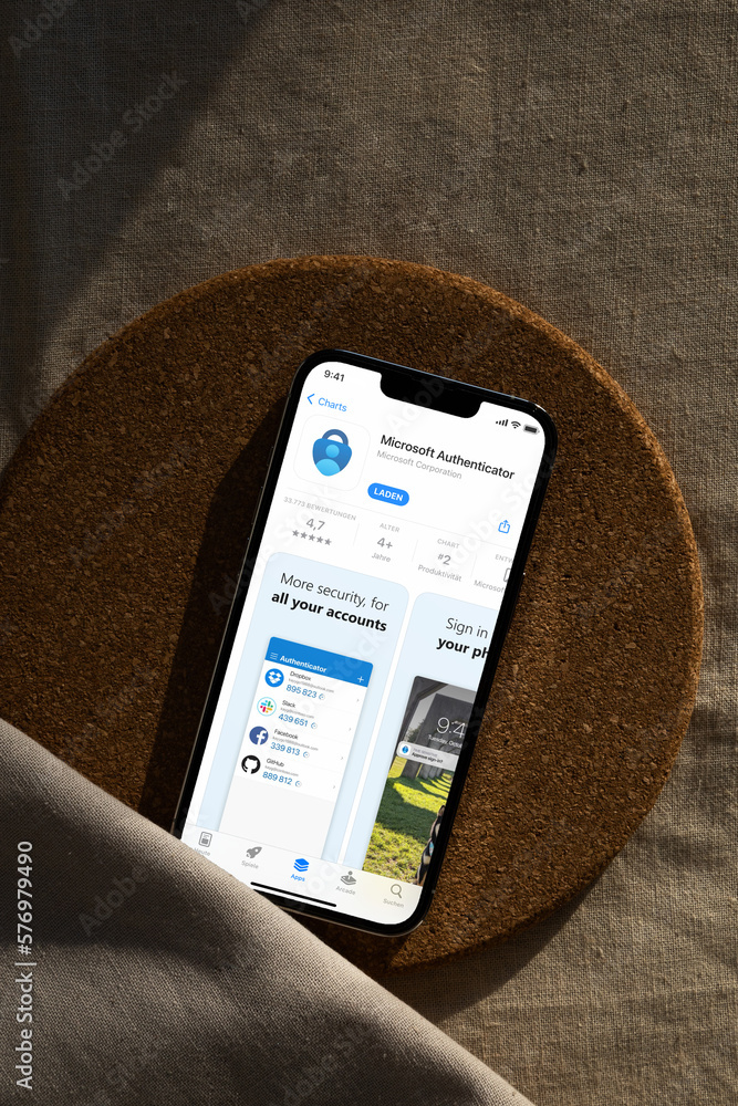 Mobile phone with Microsoft Authenticator App Store screen Stock Photo ...