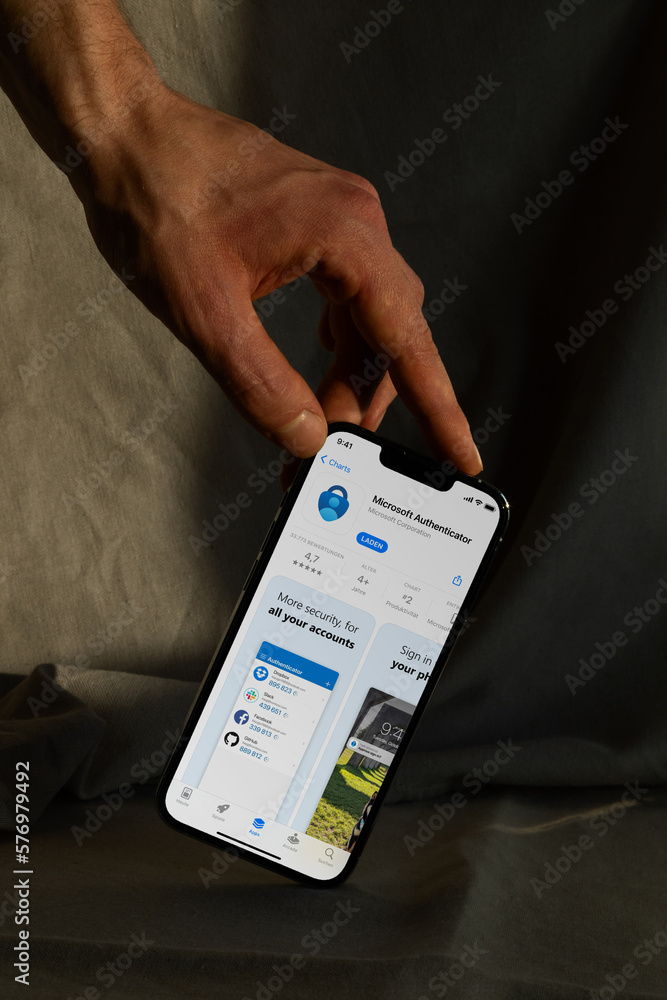 Mobile phone with Microsoft Authenticator App Store screen Stock Photo ...