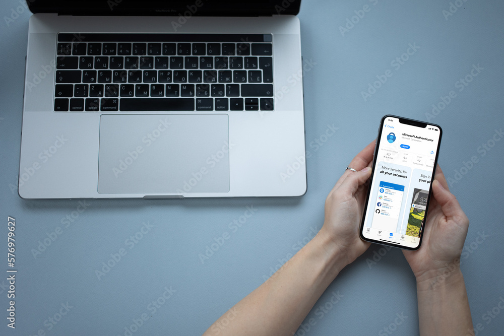 Mobile phone with Microsoft Authenticator App Store screen Stock Photo ...