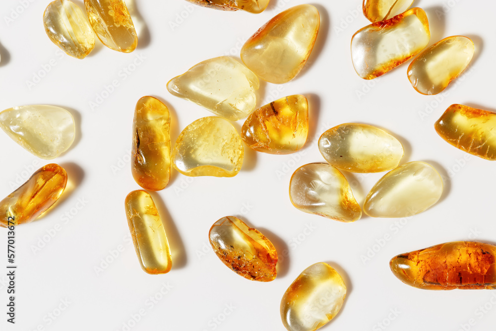 Natural gemstone amber texture background, light stones yellow ivory ...
