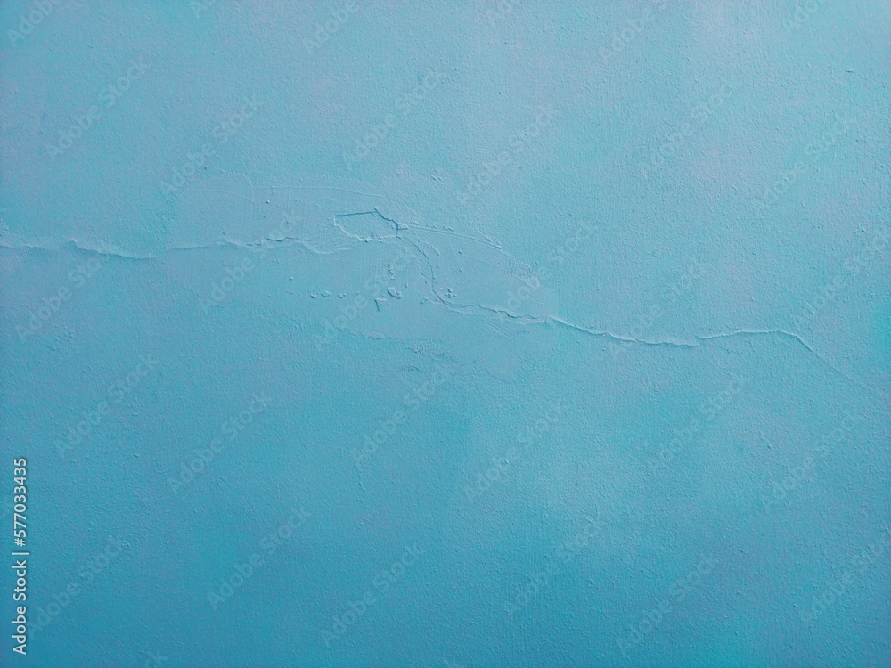 Texture gradient wall with a crack macro surface of shades of blue and ...