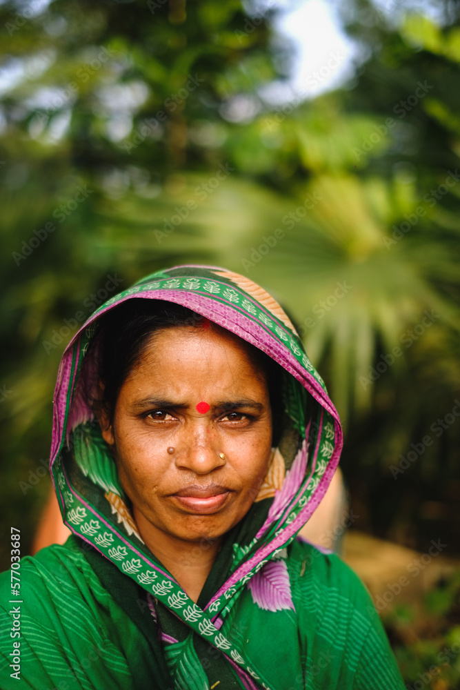portrait of a woman in green dress within green environment Stock Photo ...