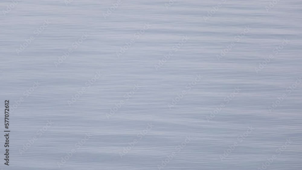 Continuously changing blue sea or ocean surface for a background ...