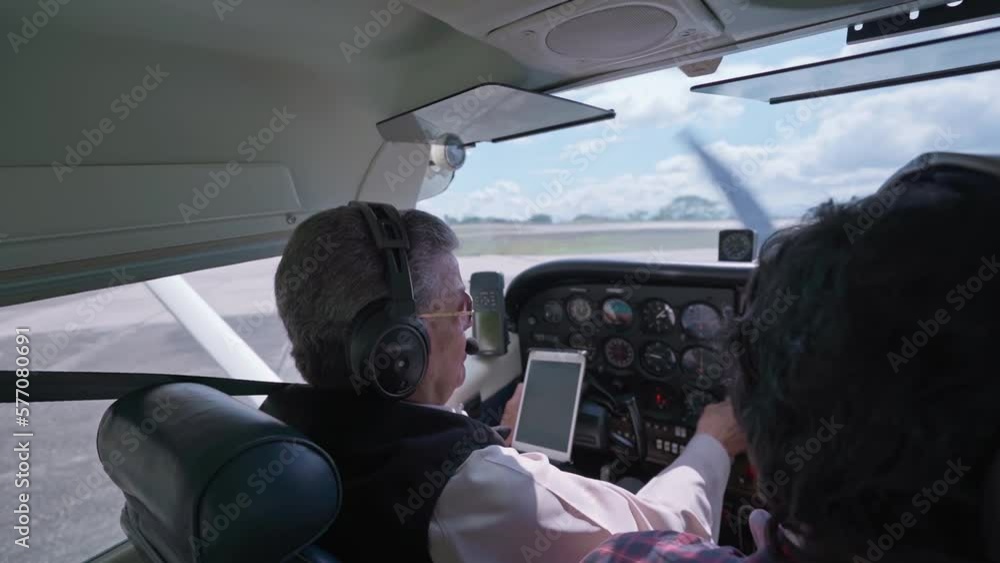 Vidéo Stock Pilot doing preflight checklist before take off at the ...
