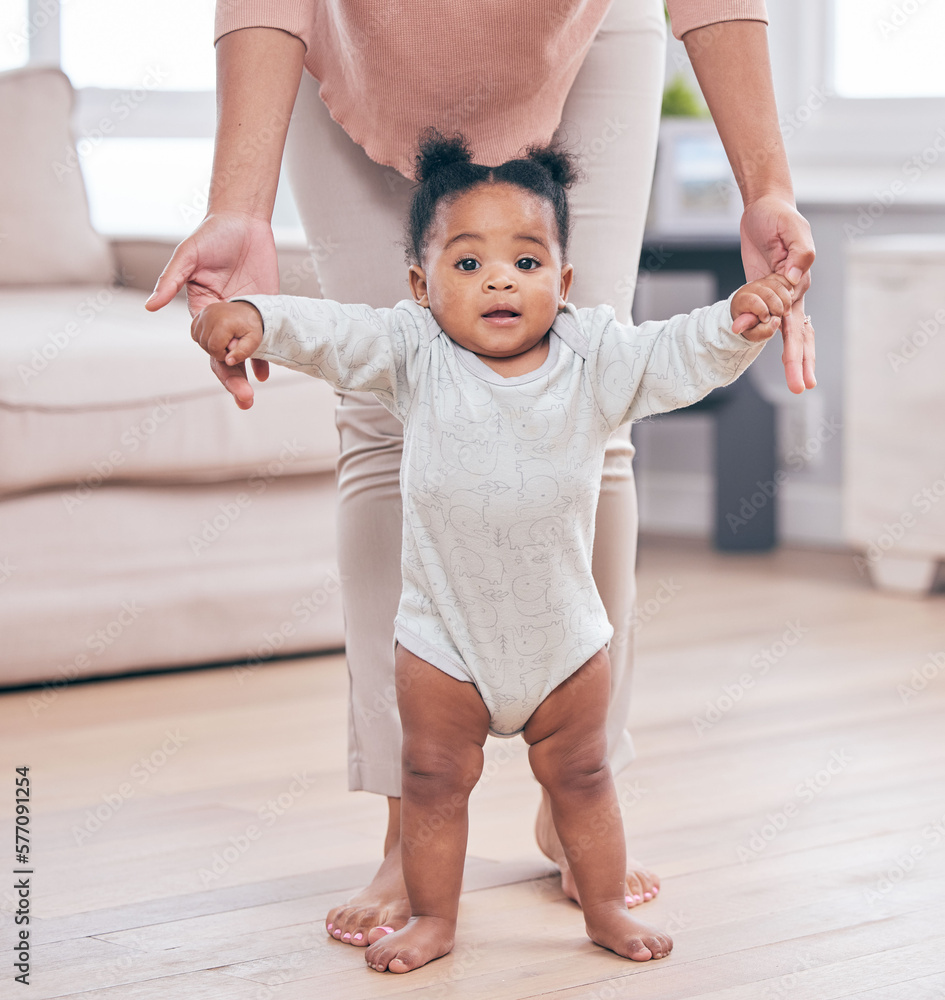Black baby portrait, walking and learning with mother in a living room ...