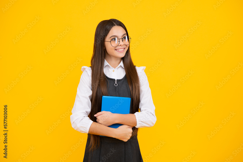 Schoolgirl with copy book posing on isolated background. Literature ...