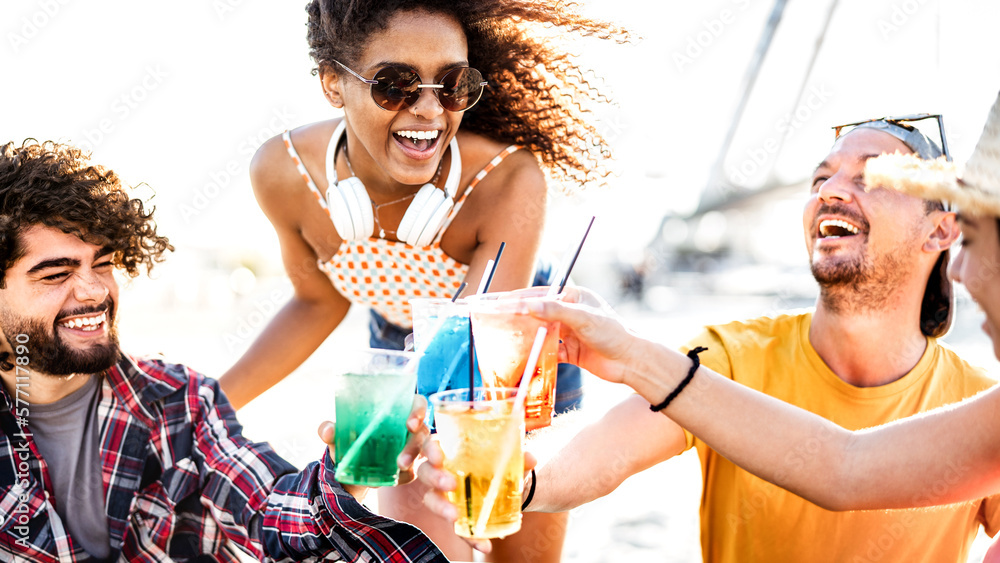 Happy guys and girls cheering at sunset on vacation days - Summer life ...