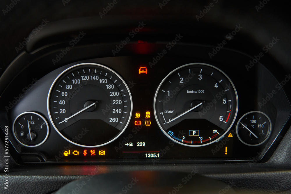 car dashboard with signs and symbols, fuel, speed, engine speed, engine ...