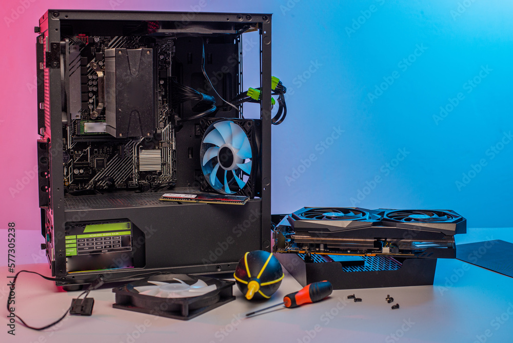 Building of PC, ATX motherboard and computer power supply unit inserted ...