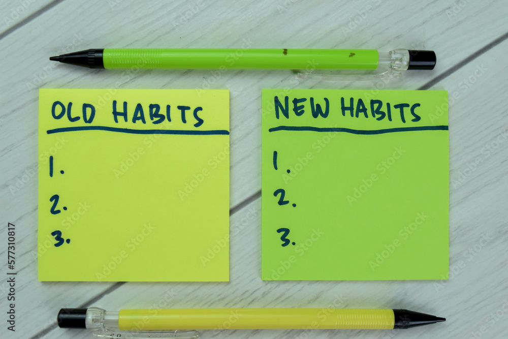 Concept of Old Habits and New Habits write on sticky notes supported by ...