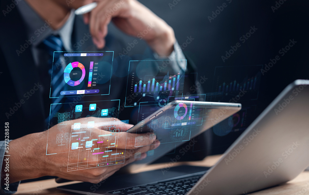 Analyst working with computer in Business Analytics and Data Management ...