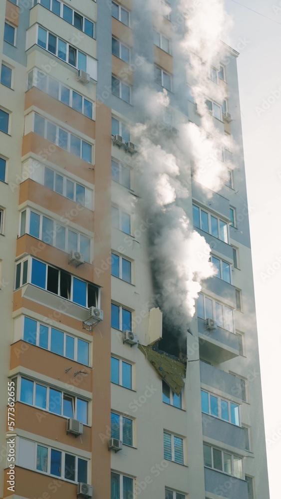 KYIV, UKRAINE - NOVEMBER 15, 2022: Fire in an apartment building. Blue ...