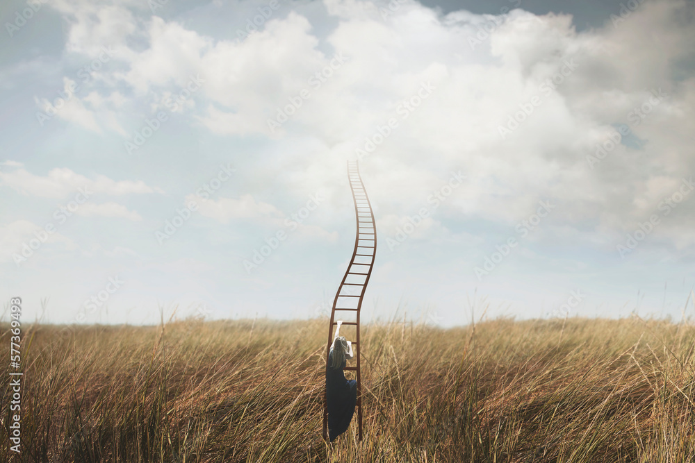 Zdjęcie Stock: surreal moment of a woman climbing a long ladder leading ...