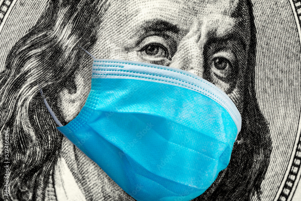 Macro 100 dollar bill shows Benjamin Franklin wearing a surgical mask ...