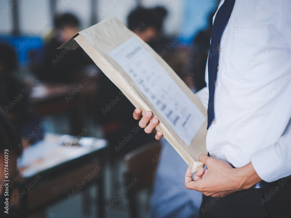 The teacher controls the exam room for students to take the exam in the ...