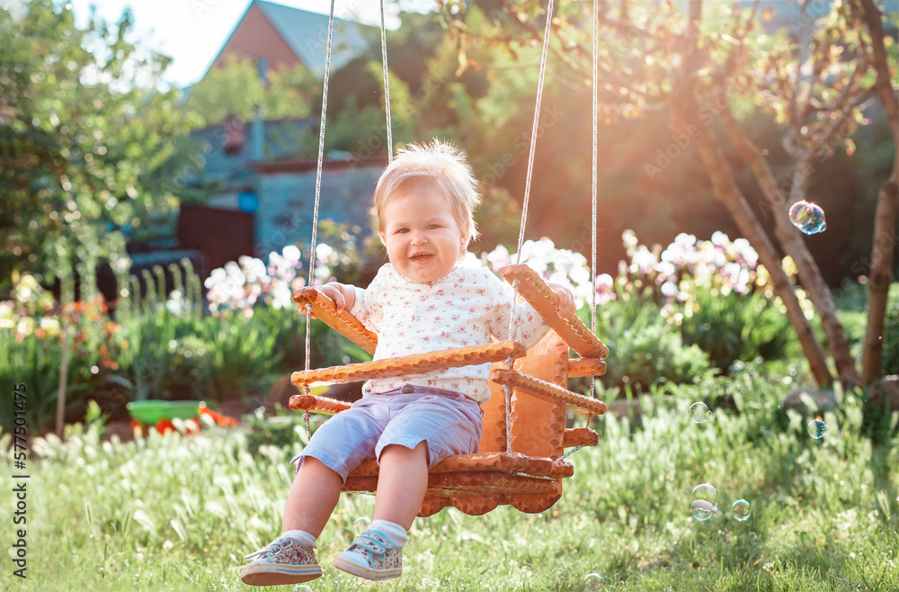 Happy International Children's Day. Smiling toddler girl having fun on ...