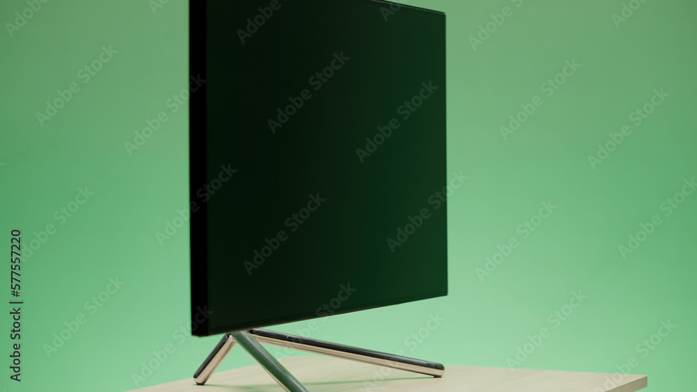 Large plasma TV. Action. A blue background with a changing color with a ...