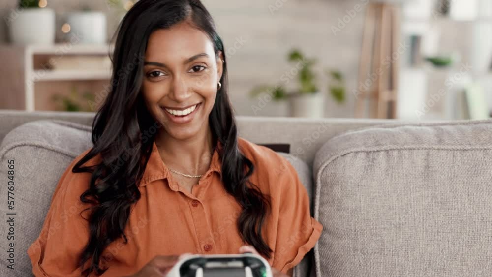 Black woman gamer, controller and sofa in home living room in ...