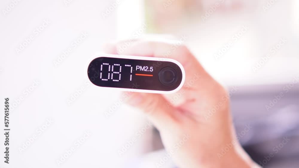 Video footage shows the use of a PM 2.5 dust measuring device in front ...