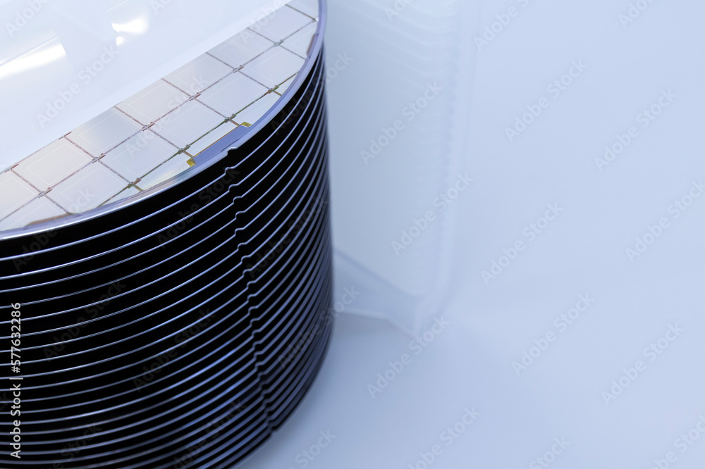 Photo A batch of silicon wafers packed in a plastic storage box in the ...