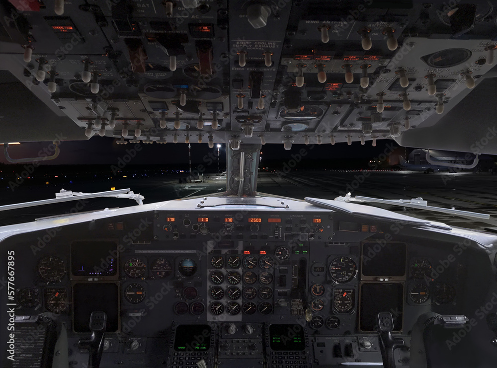 View from landed airplane pilot cockpit to the empty airfield and ...