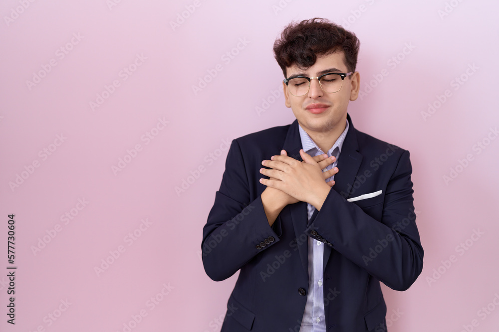 Poster Young non binary man with beard wearing suit and tie smiling ...