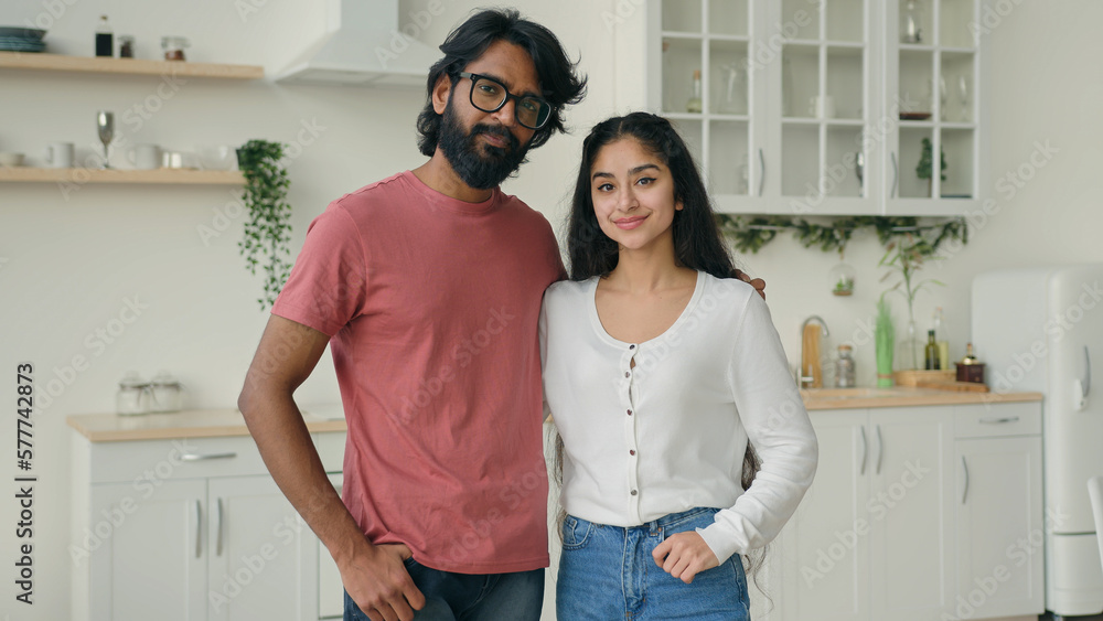 Portrait of two people multiracial couple in love posing in domestic ...