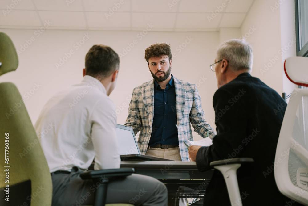 Angry boss warning the employees Stock Photo | Adobe Stock