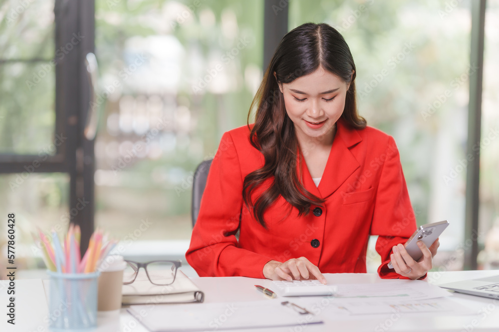 Female attractive asian banker accountant wearing red formal suit ...