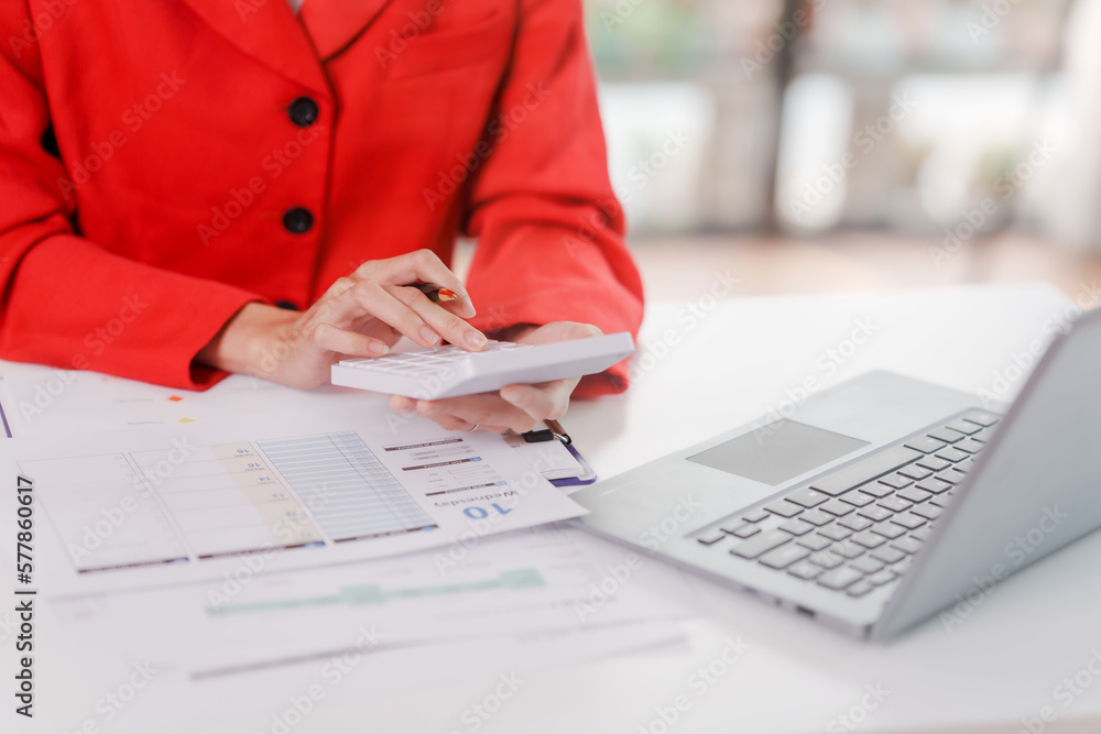 Female attractive asian banker accountant wearing red formal suit ...