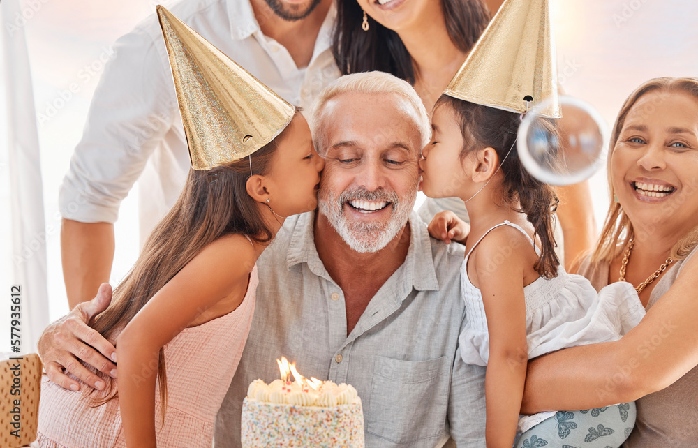 Family, birthday and girls kiss grandfather at home in celebration. Big ...