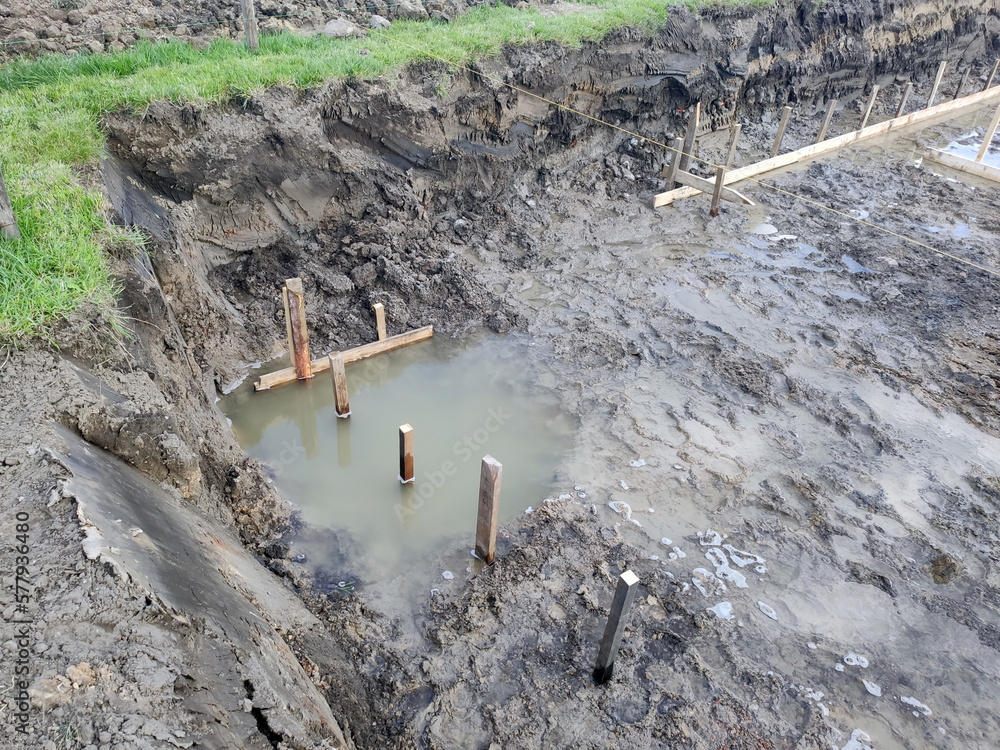 Flooded trench prepared for the construction of foundations. Stock ...