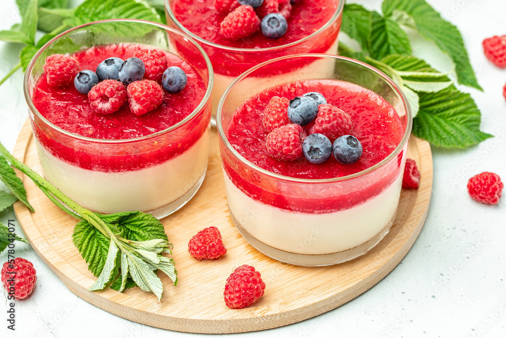 Italian dessert. Raspberry Panna cotta with raspberry jelly on a light ...