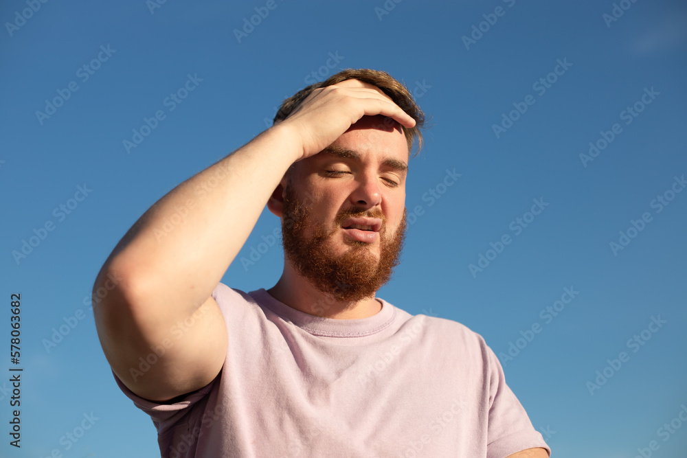 portrait of tired sick exhausted man, handsome guy is suffering from ...
