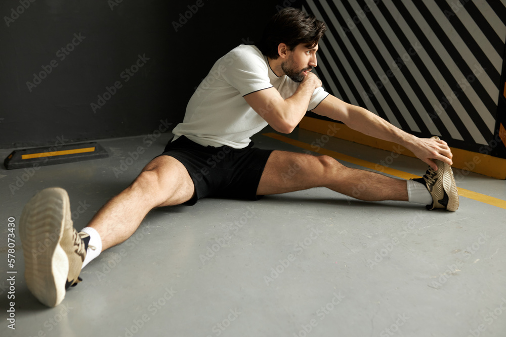 Athletic handsome male football player with muscular strong body ...