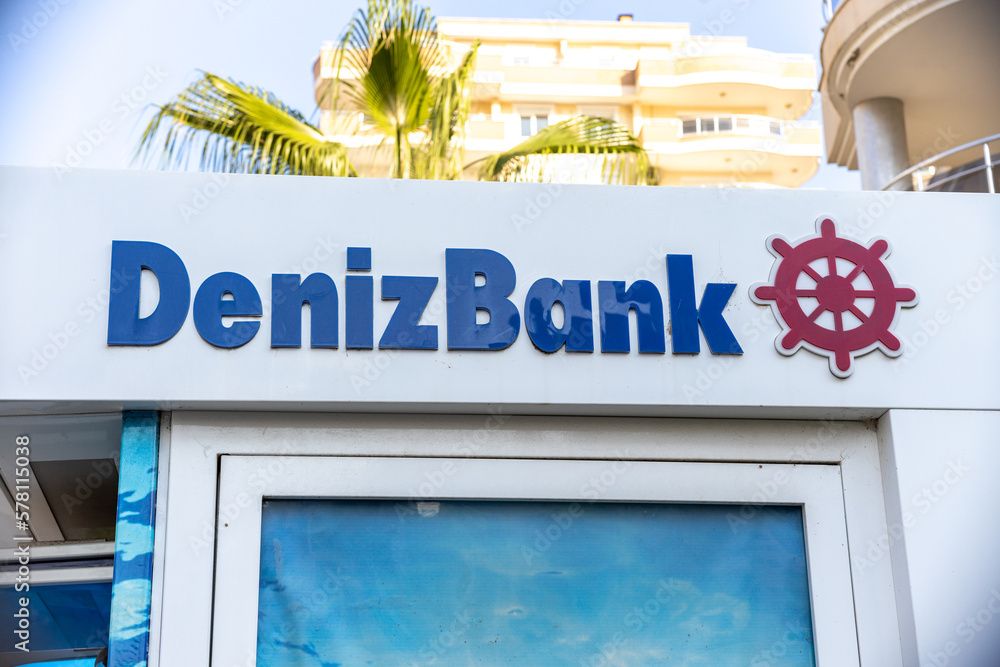 Alanya, Turkey - 21 July 2021: Deniz Bank logo on a shore city ...