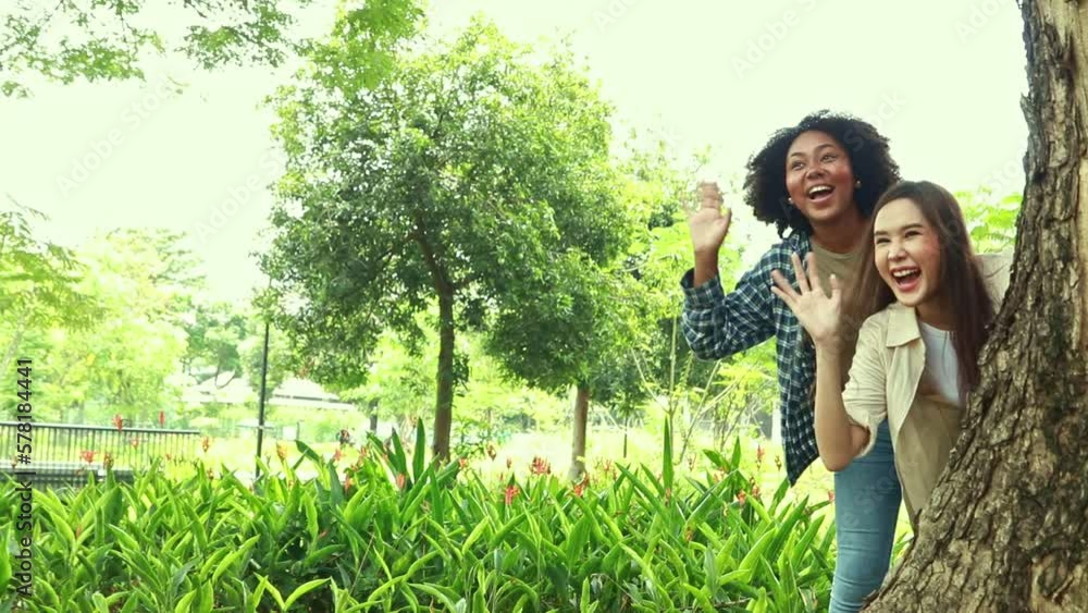 Say Hello : Two asian and african american best friends play together ...