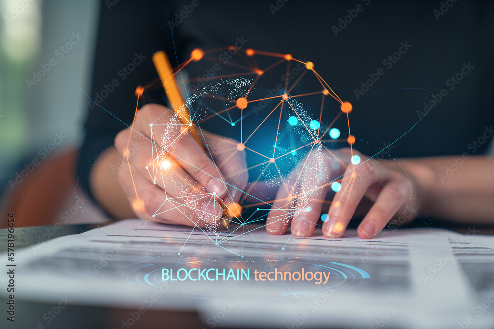 Businesswoman in formal wear taking notes signing contract at office ...