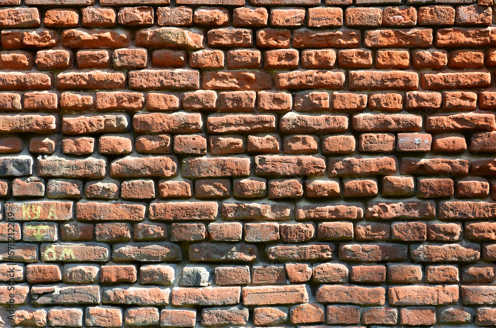 Horizontal wall texture of several rows of very old brickwork made of ...