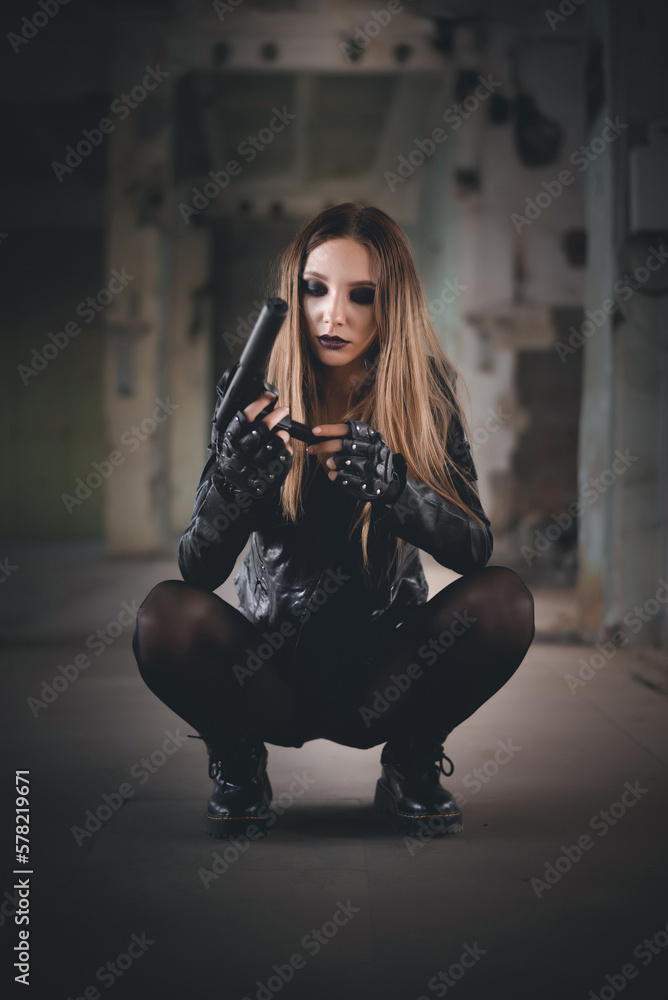 Beautiful girl a secret agent with silenced pistol concept. Stock Photo ...