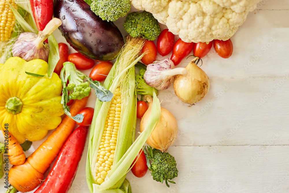 Top view of different fresh farm vegetables on the white background ...