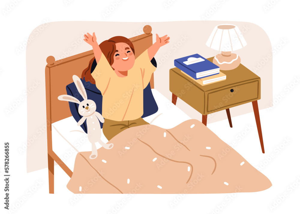 Happy kid waking up. Cute girl stretching on bed in morning. Smiling ...