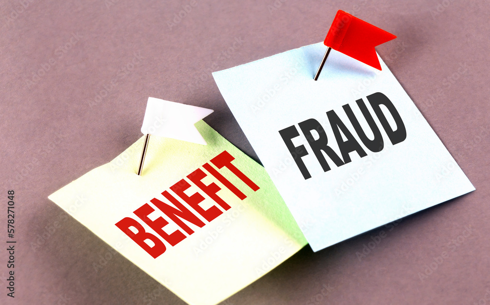 BENEFIT FRAUD text on a sticky on grey background Stock Photo | Adobe Stock