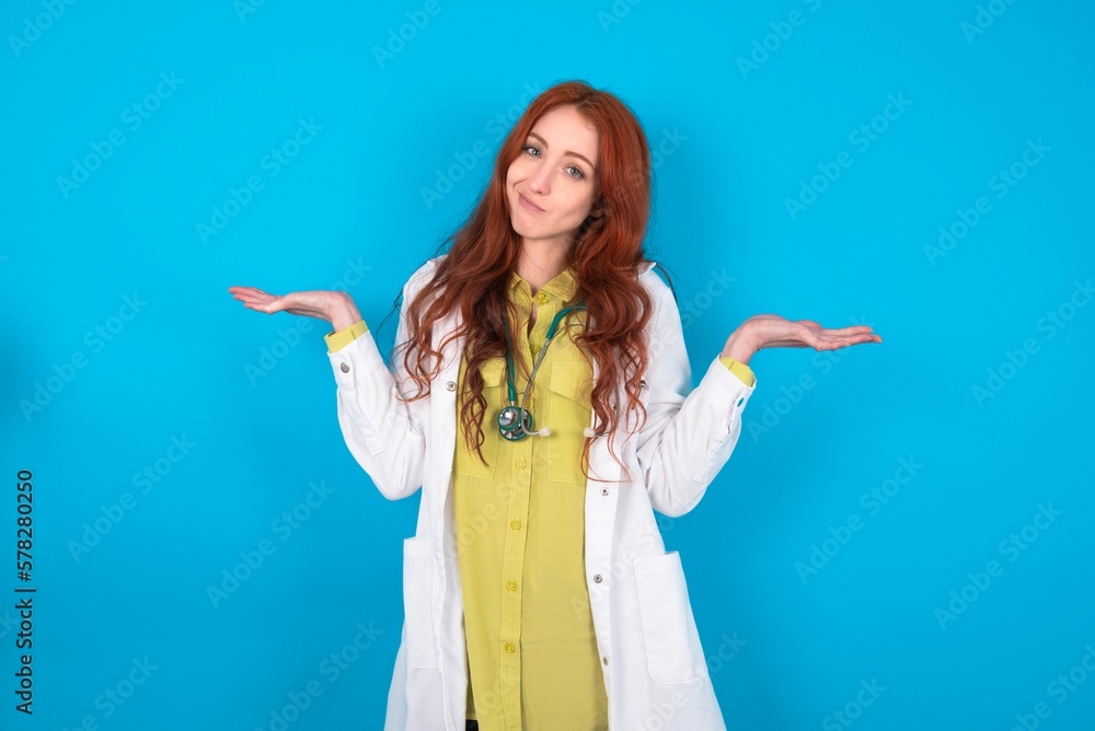 Careless attractive young doctor woman wearing medical uniform over ...