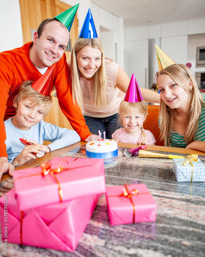 Family Life, 3 Years Old. A young family party celebrating the daughter ...