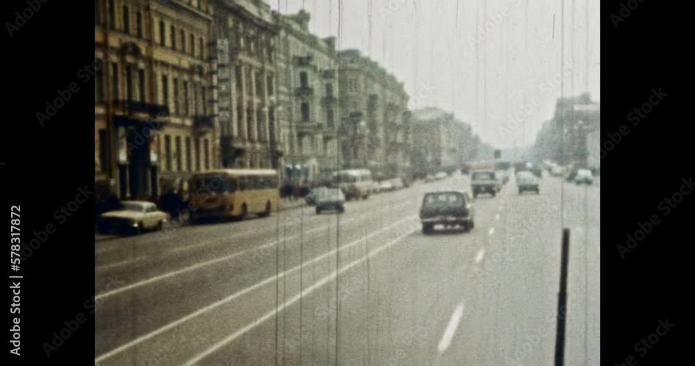 Road traffic in old city in summer. 1980s Petersburg, Russia. Cars ...