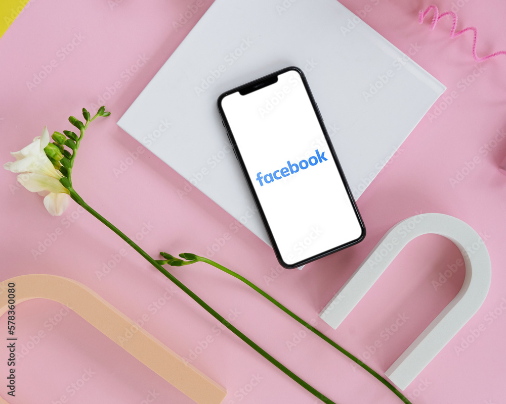 Mobile phone with the Facebook Logo on the screen Stock Photo | Adobe Stock