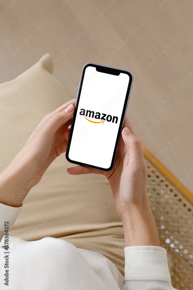 Mobile phone with the Amazon Logo on the screen Stock Photo | Adobe Stock