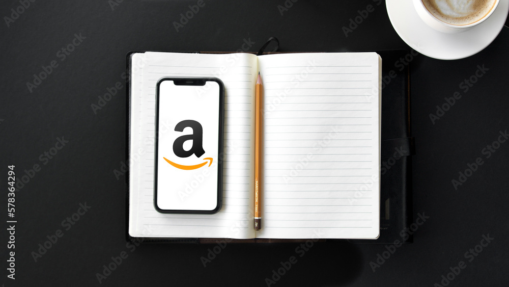 Mobile phone with the Amazon Logo on the screen Stock Photo | Adobe Stock